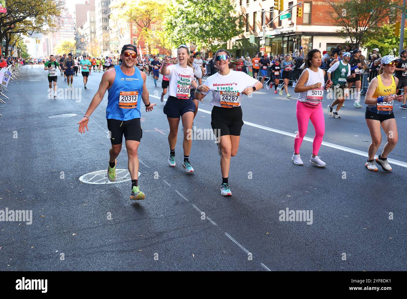 Runners trudge up First Avenue at Mile 16 of the 2024 New York City ...