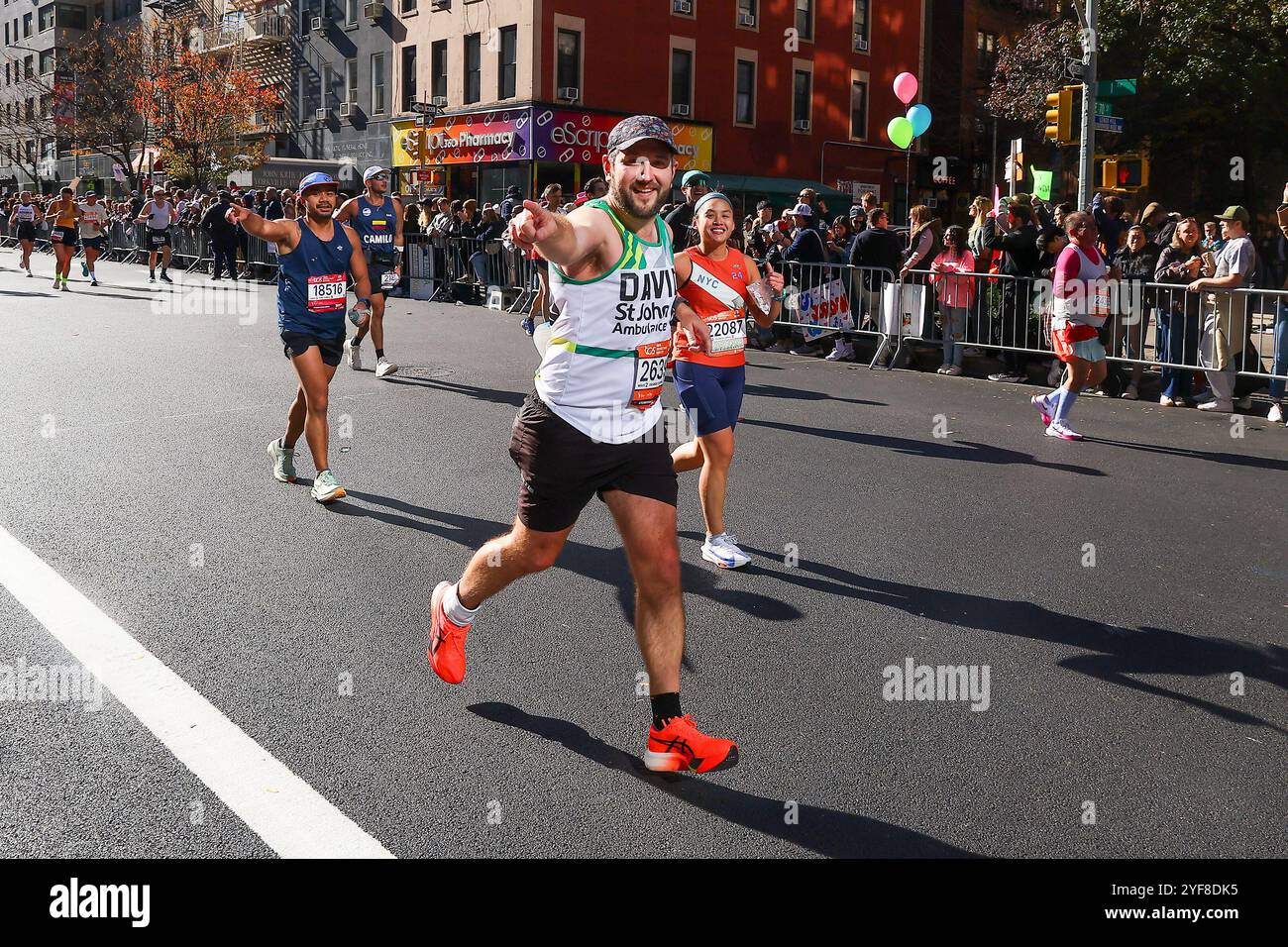 Runners trudge up First Avenue at Mile 16 of the 2024 New York City ...