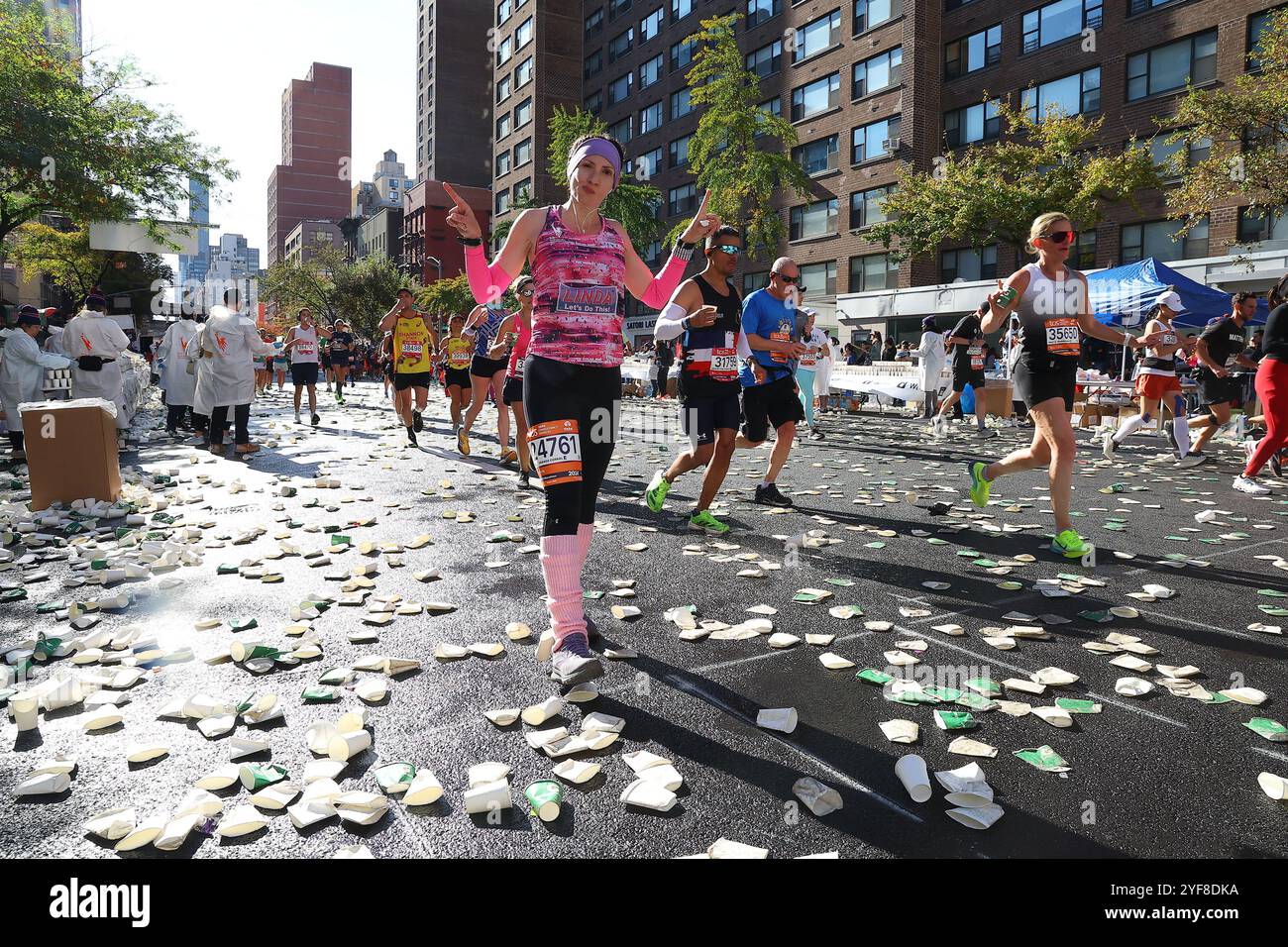 Runners trudge up First Avenue at Mile 16 of the 2024 New York City ...