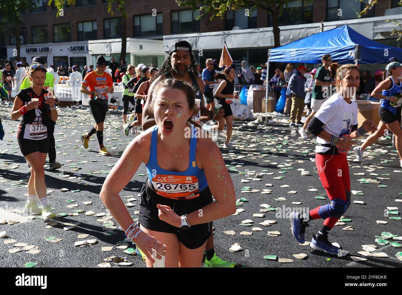Runners trudge up First Avenue at Mile 16 of the 2024 New York City ...