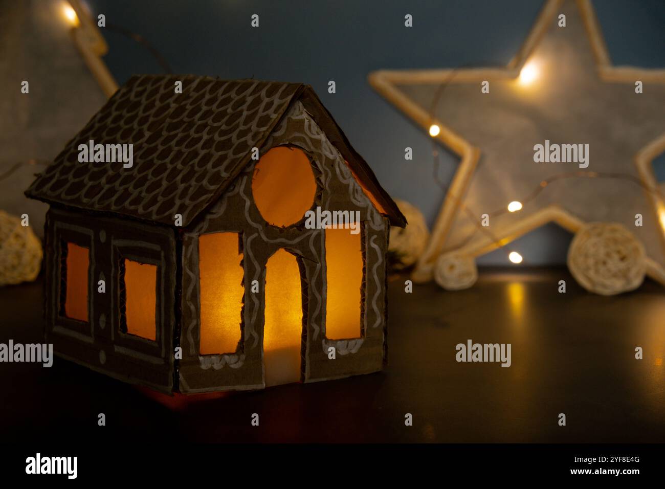 Lighted cardboard house gift hi-res stock photography and images - Alamy