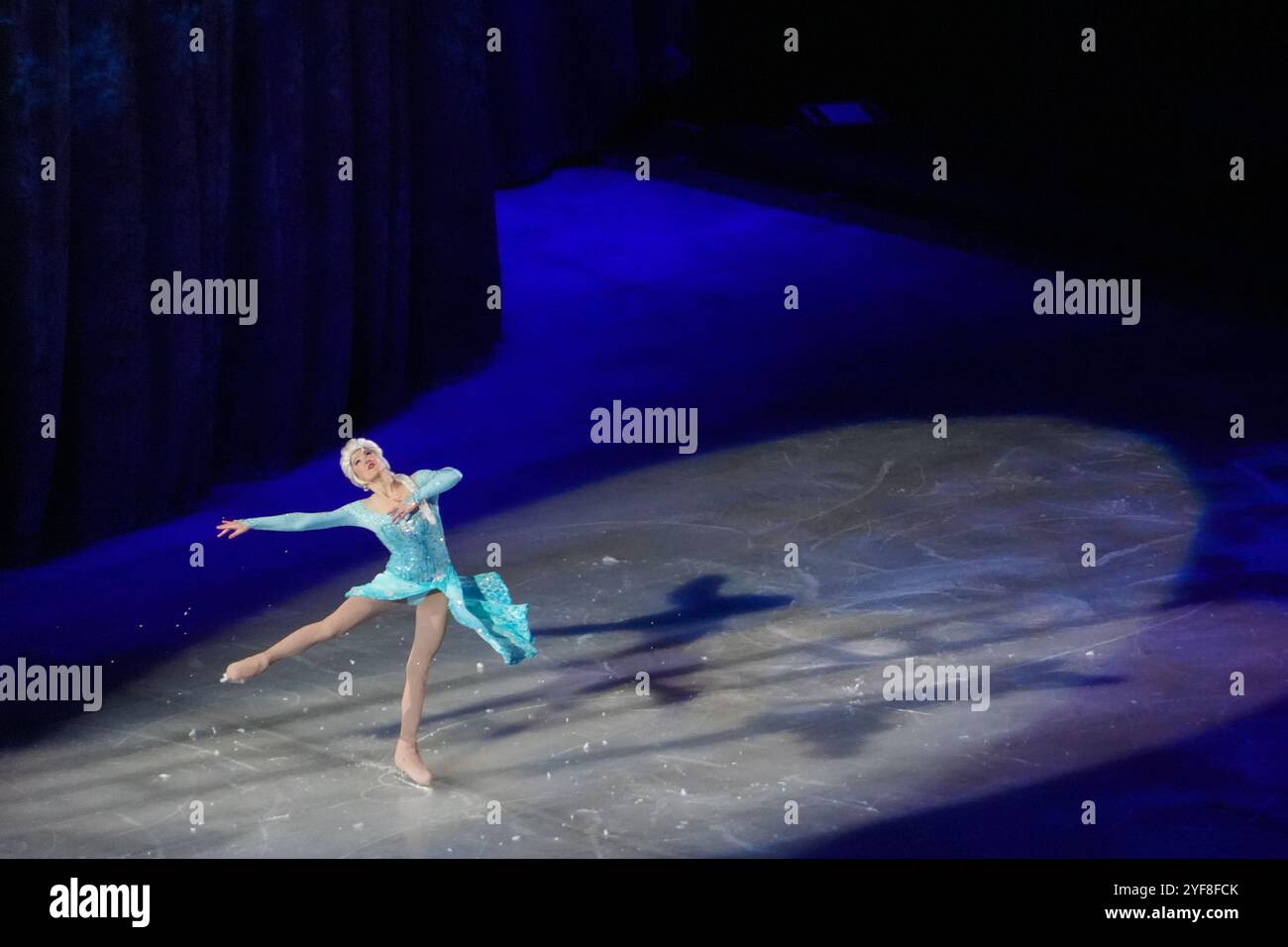An ice dancer performs the classic Disney story "Frozen". Beijing,China ...