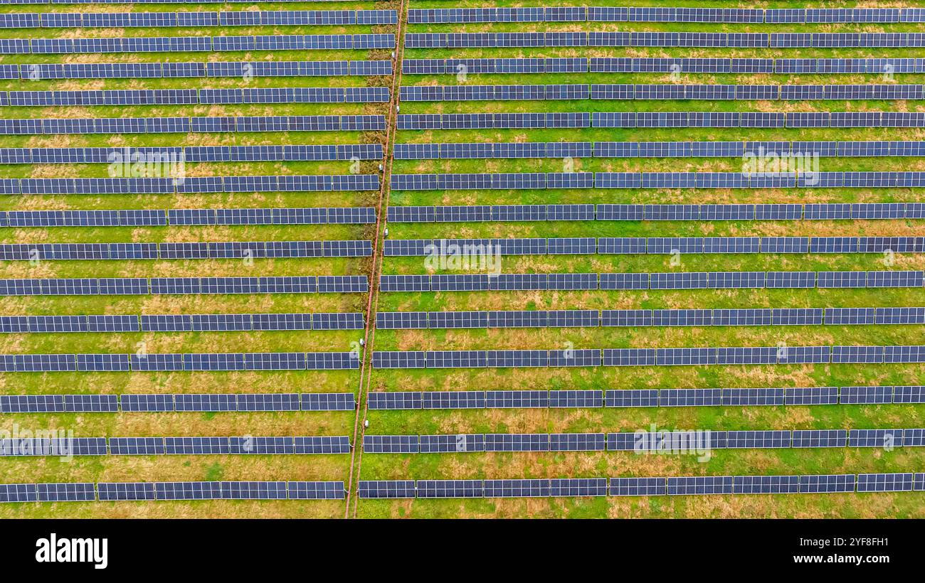 Aerial view of solar panels, photovoltaics, install on ground on a ...