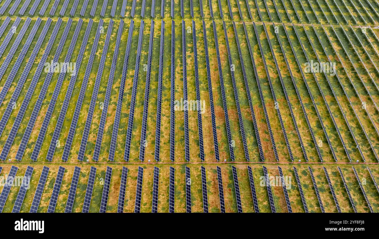Aerial view of solar panels, photovoltaics, install on ground on a ...