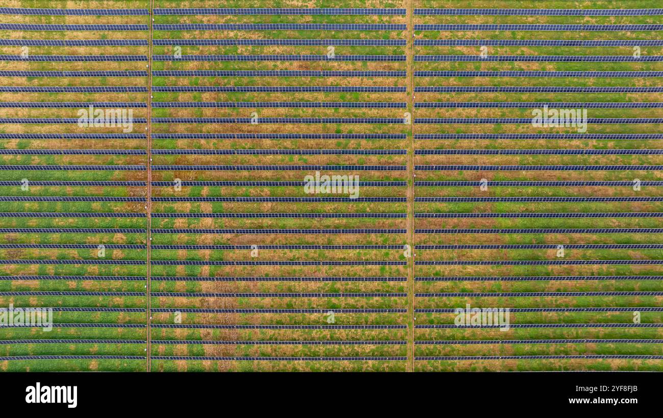 Aerial view of solar panels, photovoltaics, install on ground on a ...