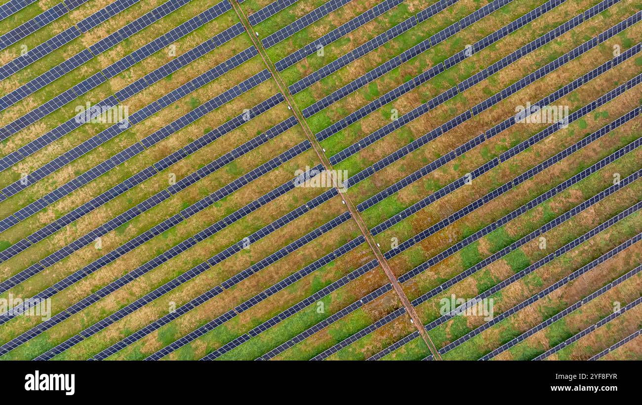 Aerial view of solar panels, photovoltaics, install on ground on a ...