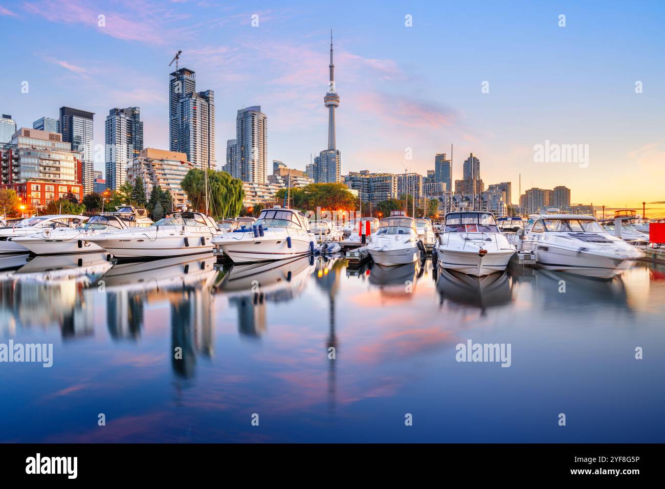 Toronto, Canada city skyline with Harbourfront at dawn on Lake Ontario ...