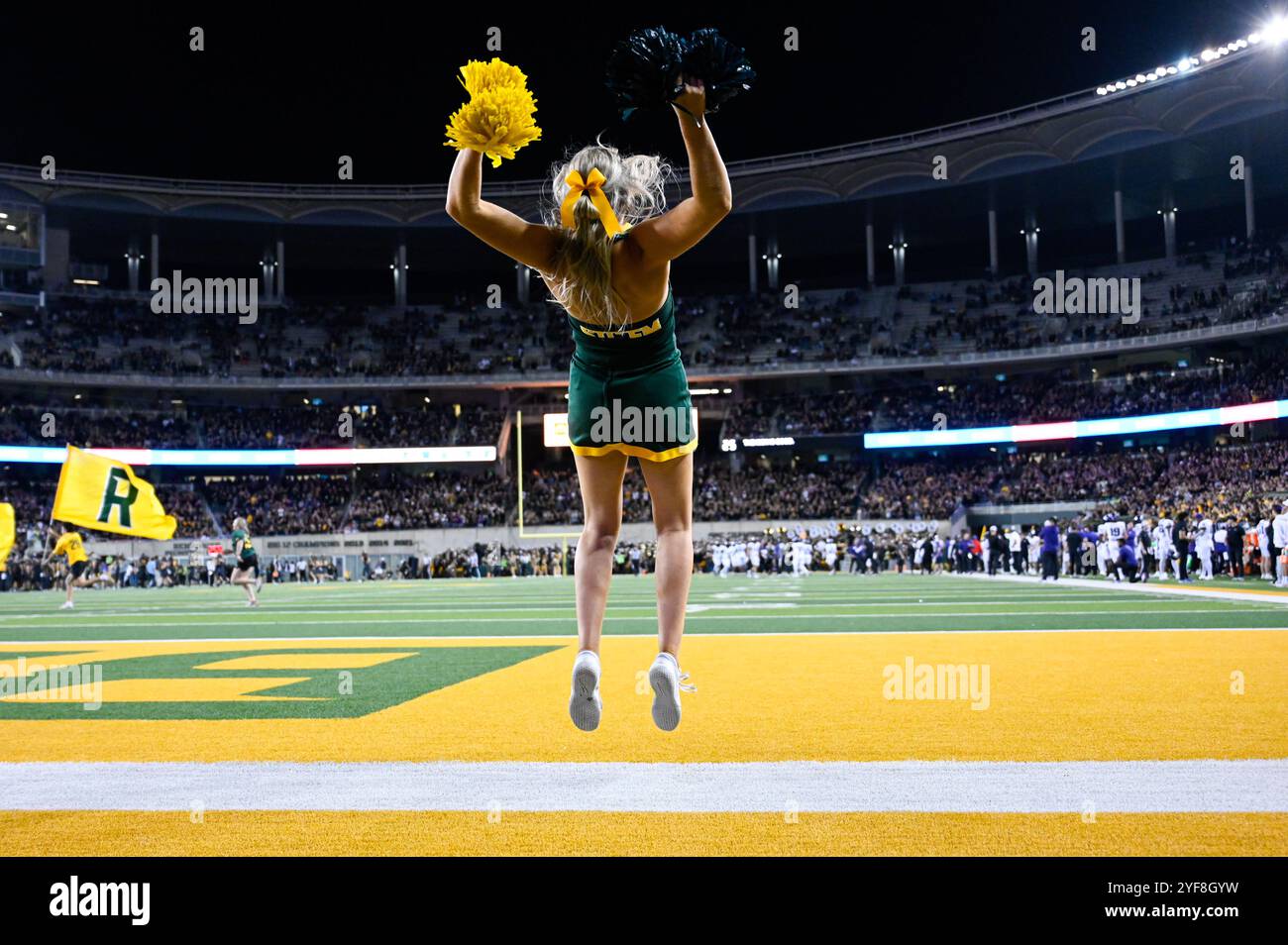 Waco, Texas, USA. 2nd Nov, 2024. Baylor Bears cheerleader flips after a ...