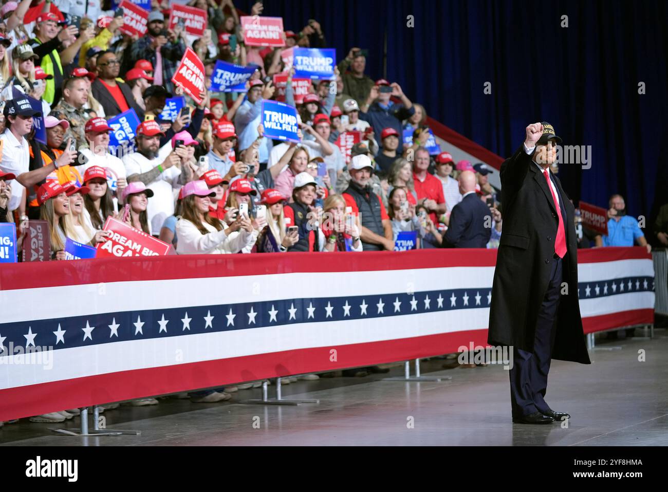 Republican presidential nominee former President Donald Trump gestures ...