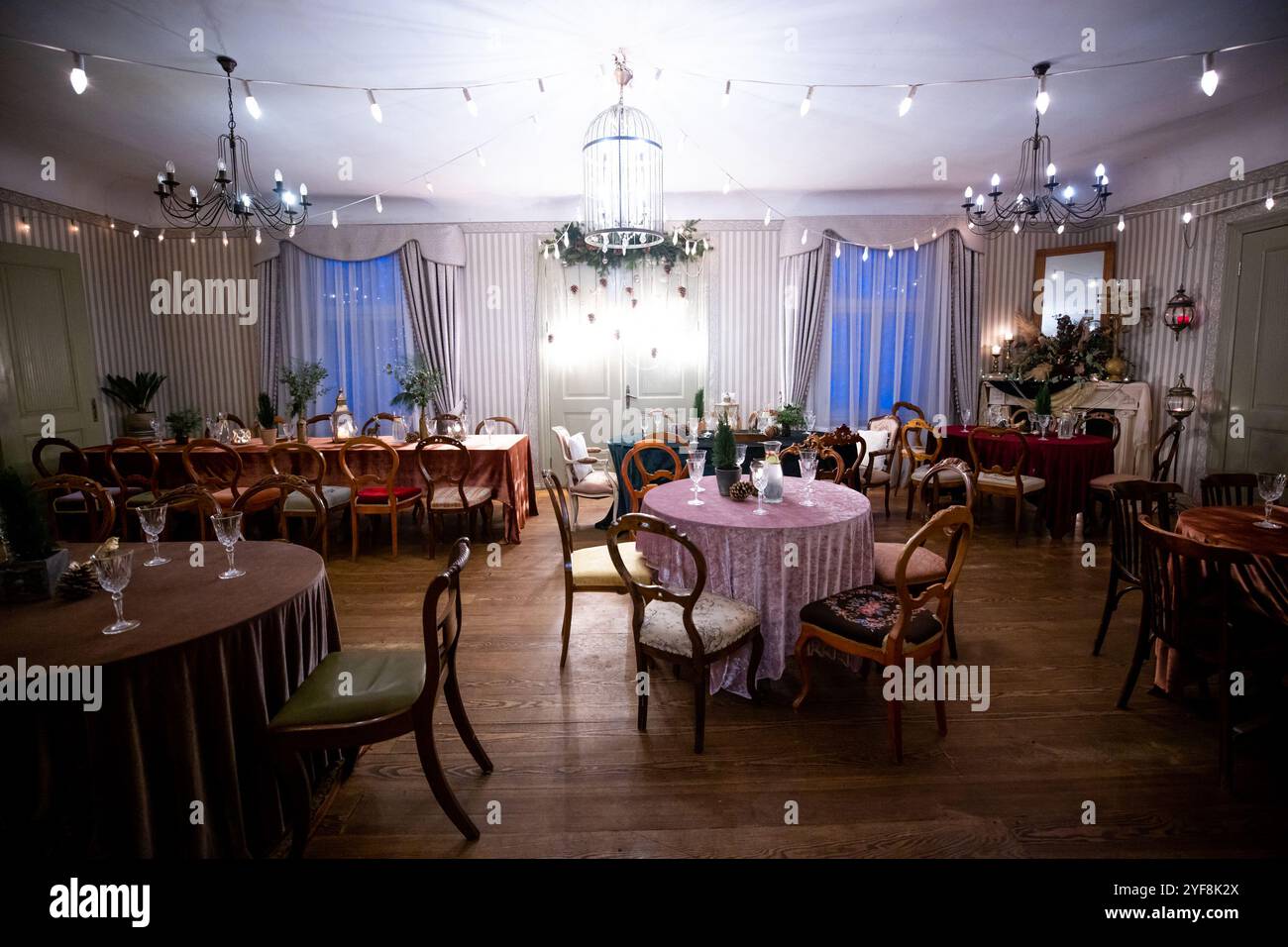 Manor table setting with glasses, perfect for a grand Yuletide feast ...