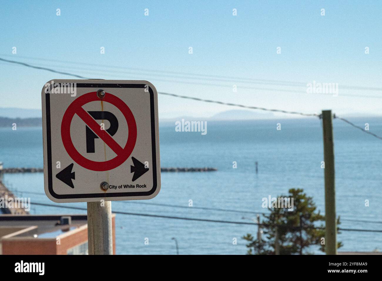Traffic sign on a beach in, White rock, Canada Stock Photo - Alamy