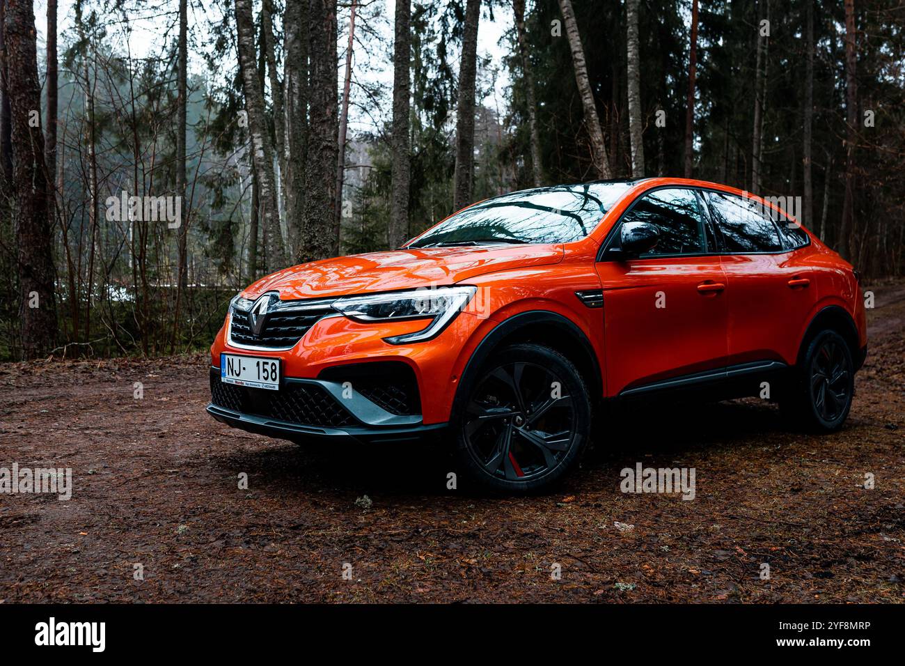New Renault Arkana RS-line Valencia Orange is a compact crossover SUV E-tech hybrid car Stock ...