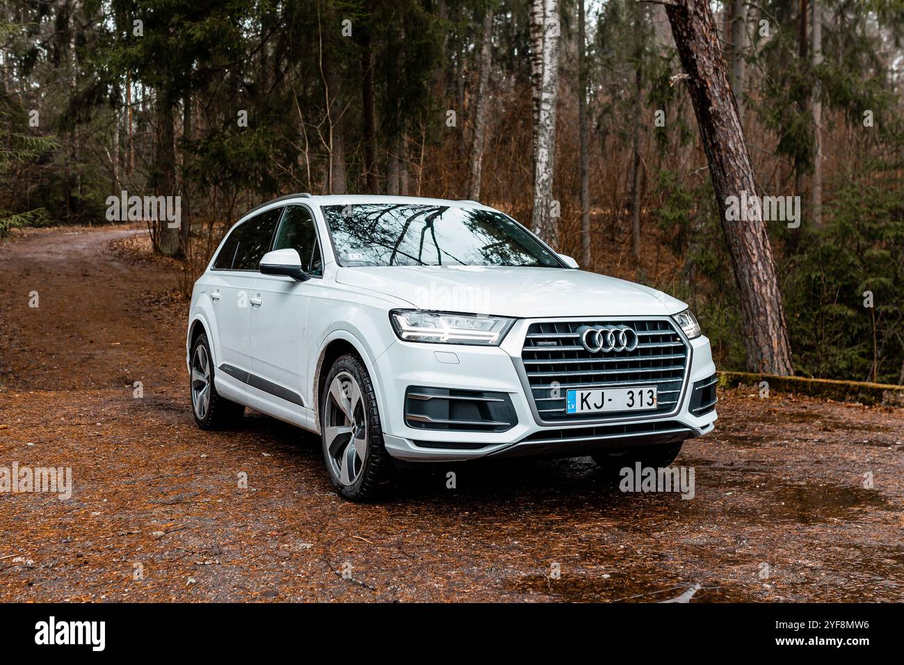 All-new white Audi quattro Q7 3.0 TFSI. Audi Q7 SUV is powered by 3.0 liter supercharged engine ...