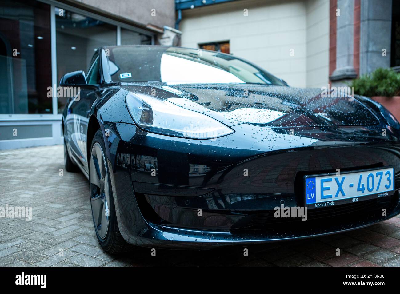 Riga, Latvia August 15, 2023 - The Tesla Model 3 is a luxury all ...