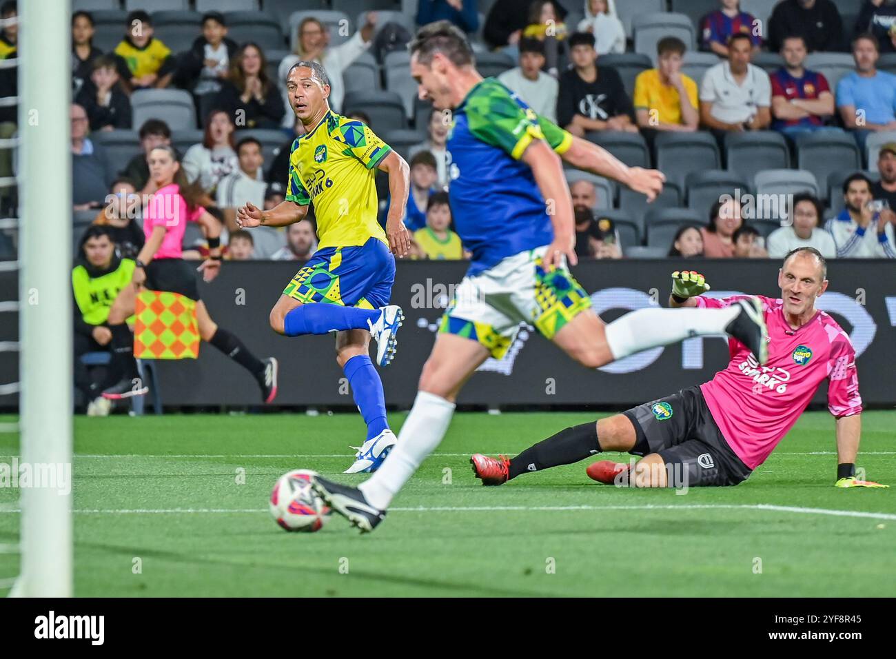 Goal attempted by Jean Narde of Ronaldinho's XI is intercepted by a ...