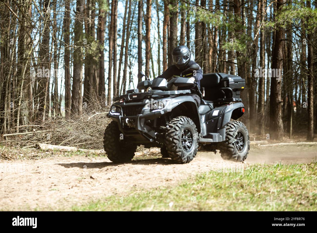 Man on quad with helmet hi-res stock photography and images - Alamy