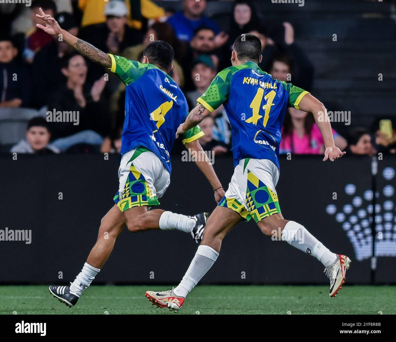 Tim Cahill and his son Kyah Cahill of Cahill's XI celebrate Tim's ...
