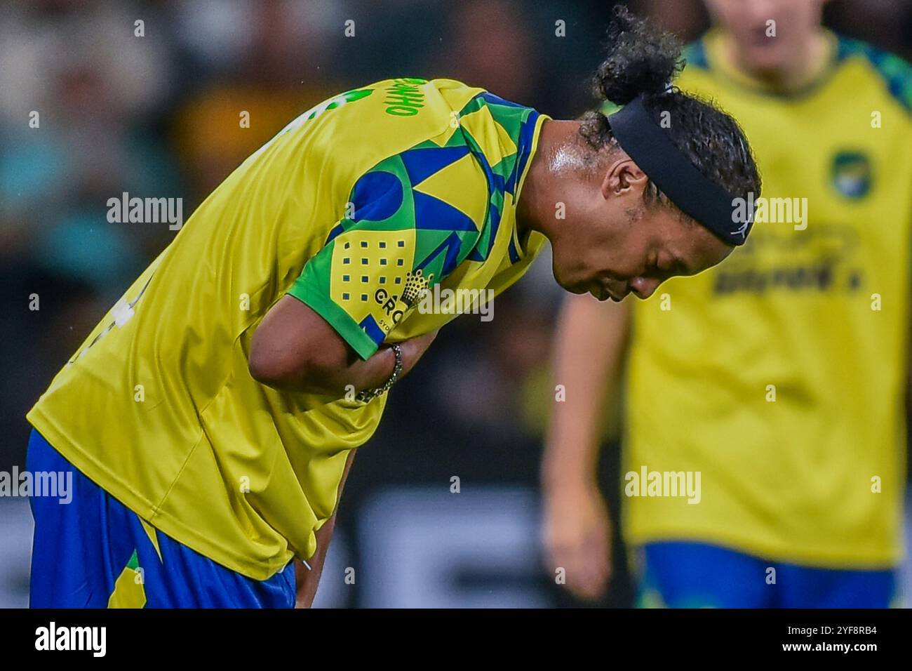 Ronaldinho of Ronaldinho's XI bows to the fans as he is subbed off ...