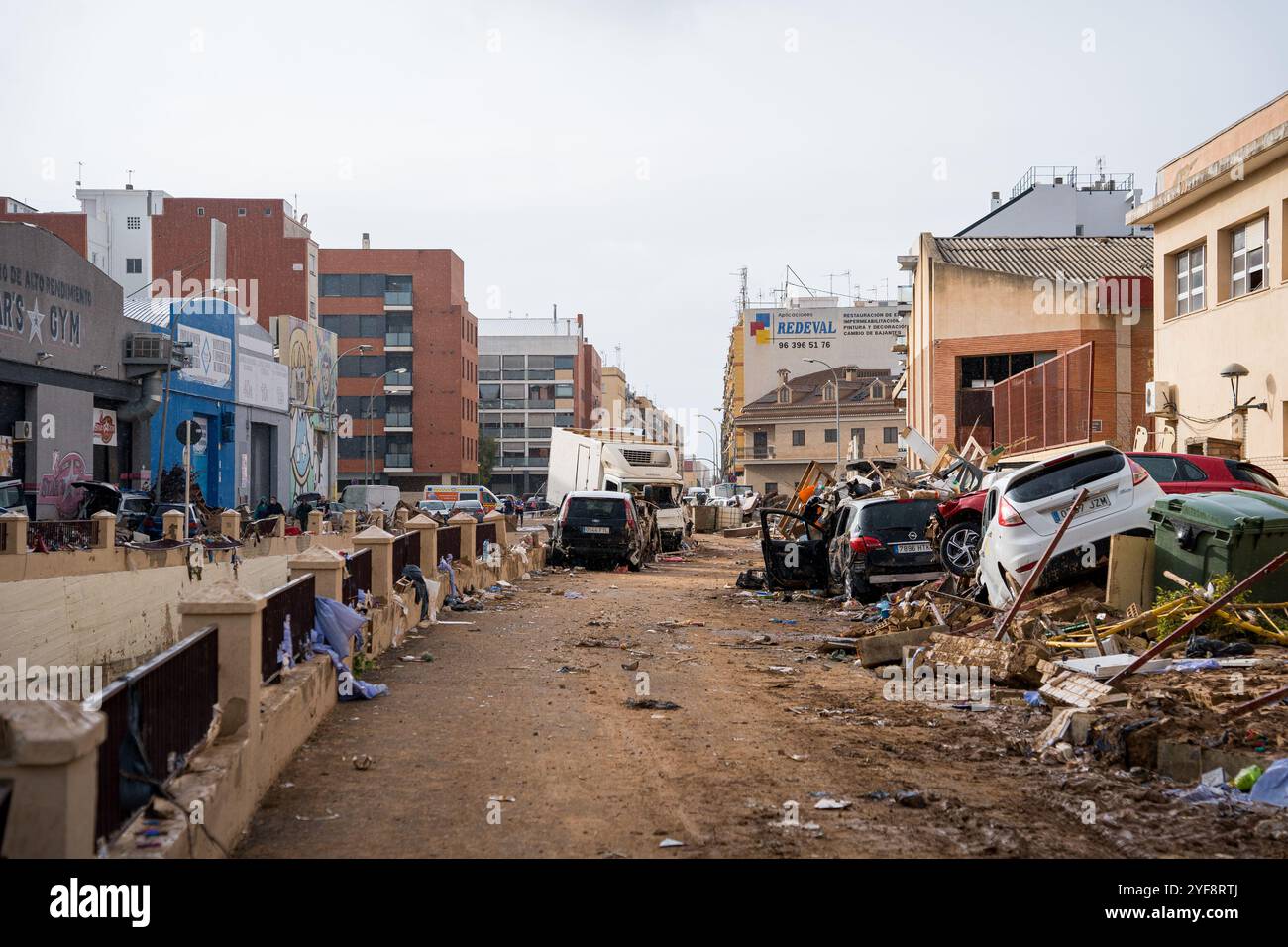 Destroyed cars and rubble are seen piled in the streets as a ...