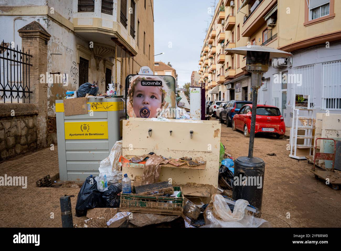 Paiporta, Spain. 03rd Nov, 2024. Cars and rubble are seen piled in the ...