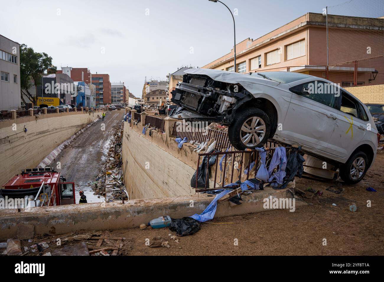 Destroyed cars and rubble are seen piled in the streets as a ...