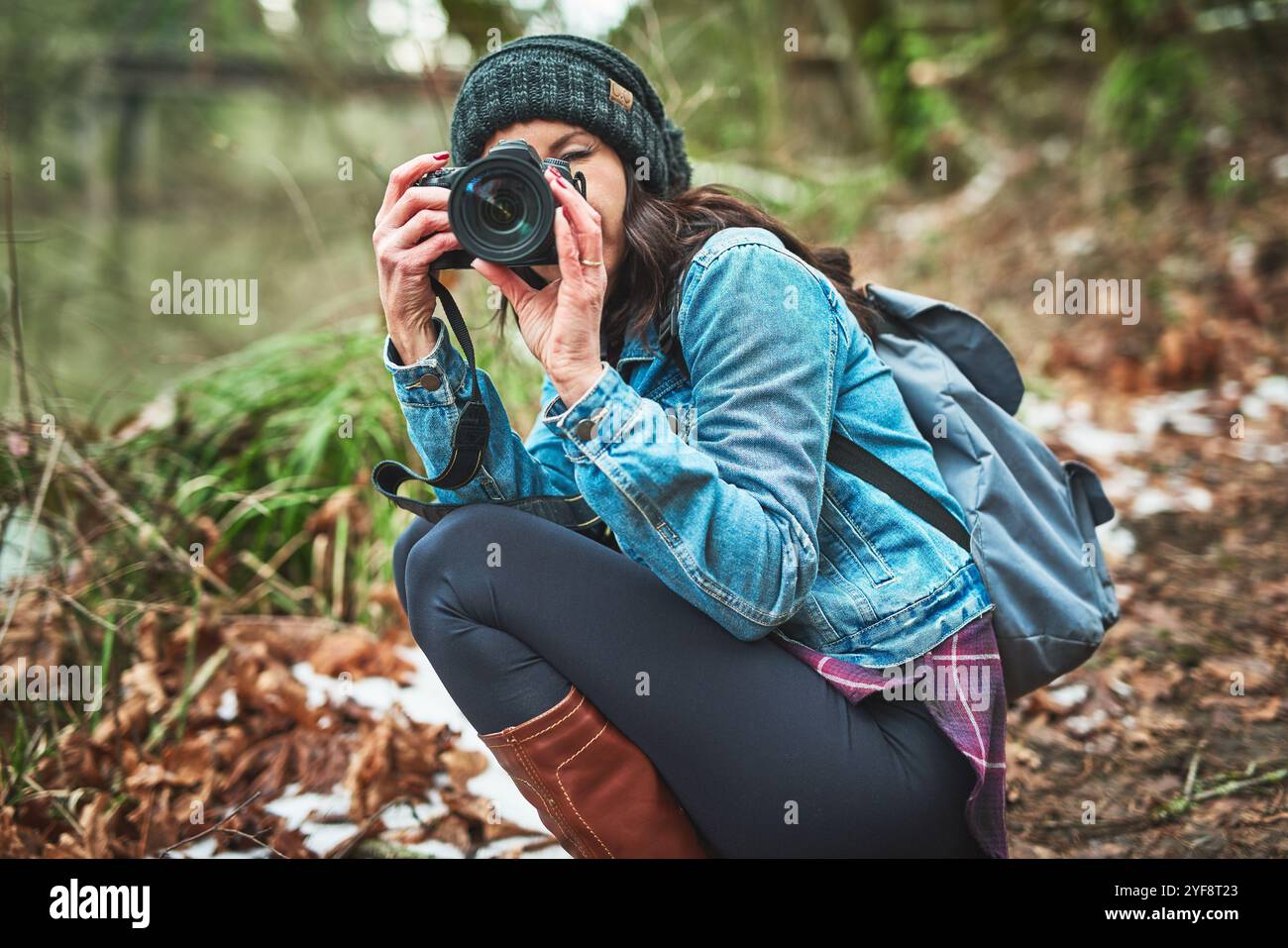 Woman, nature photographer and camera in woods with research project to ...