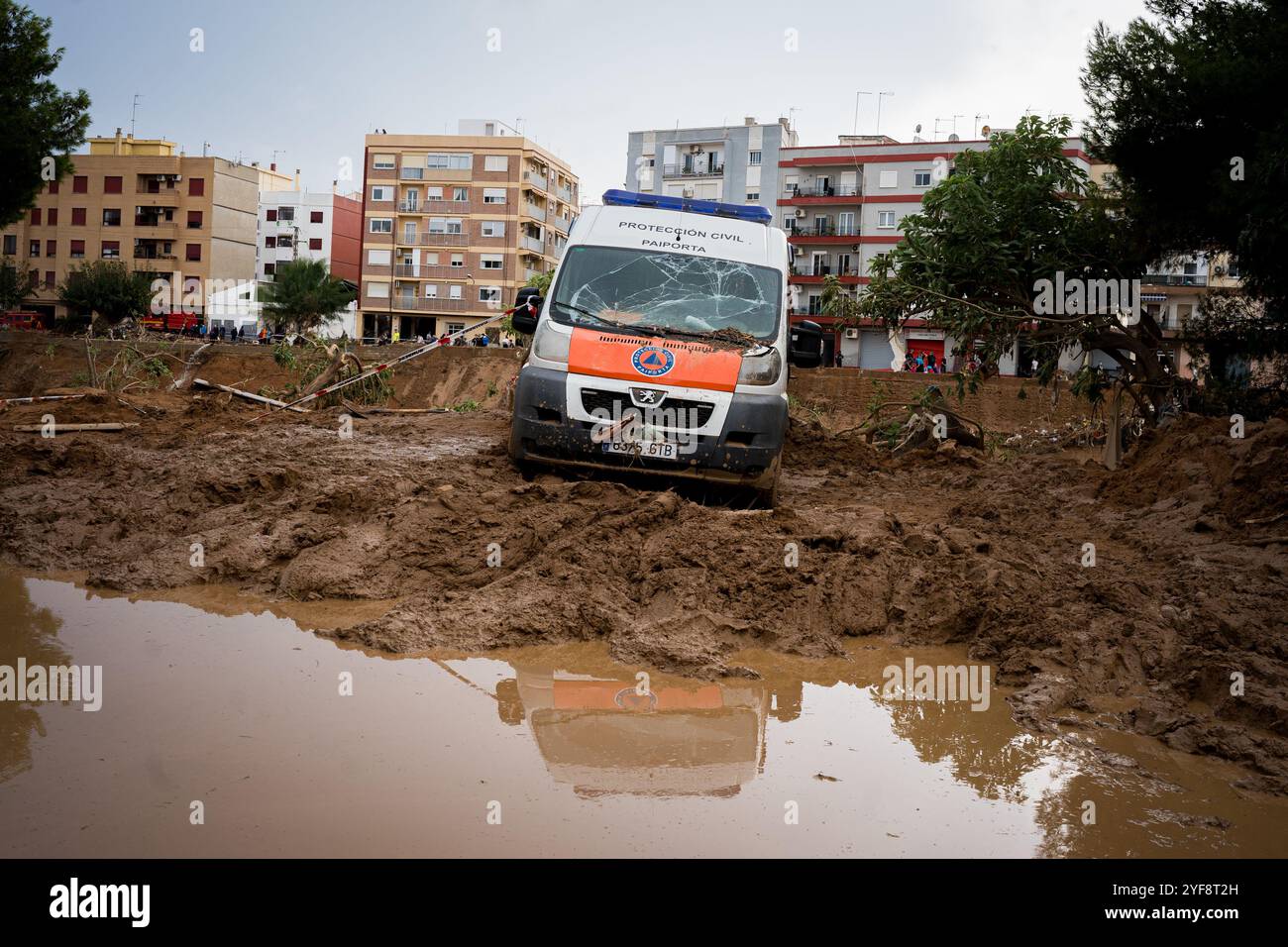 Destroyed cars and rubble are seen piled in the streets as a ...