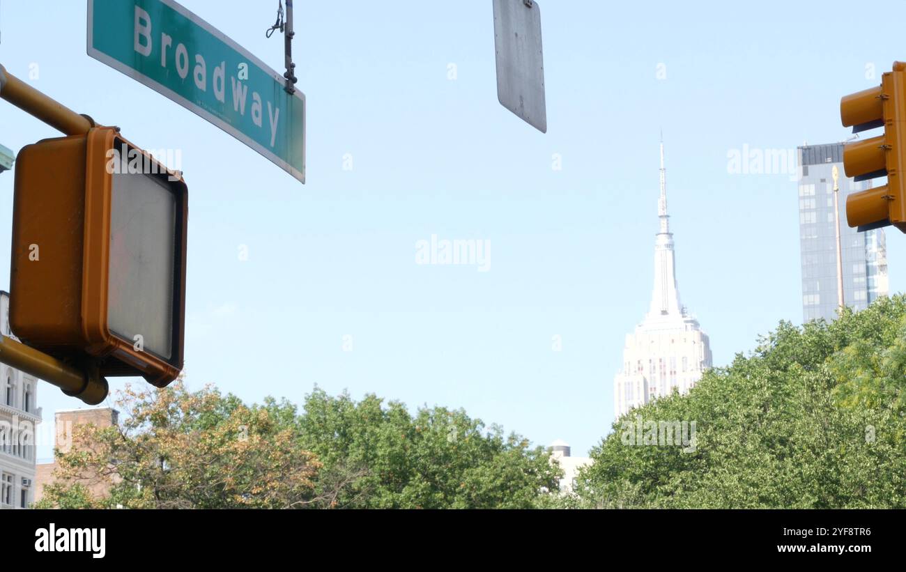 Broadway street road sign, Manhattan midtown architecture, Empire State ...