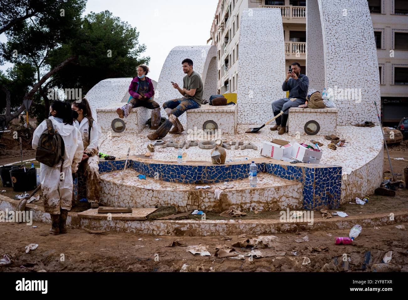 Paiporta, Spain. 03rd Nov, 2024. People are seen resting during the ...