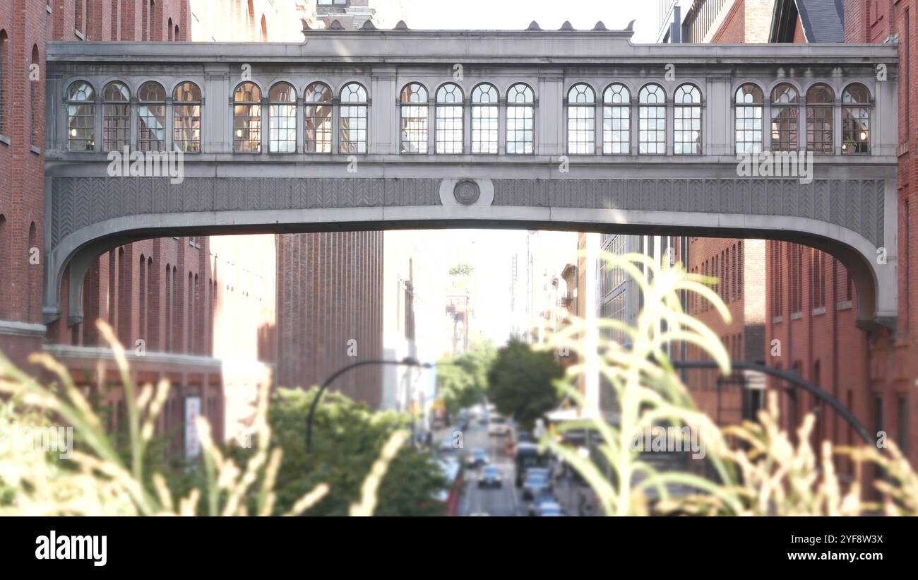 New York City street, Chelsea Market skybridge. Retro industrial ...