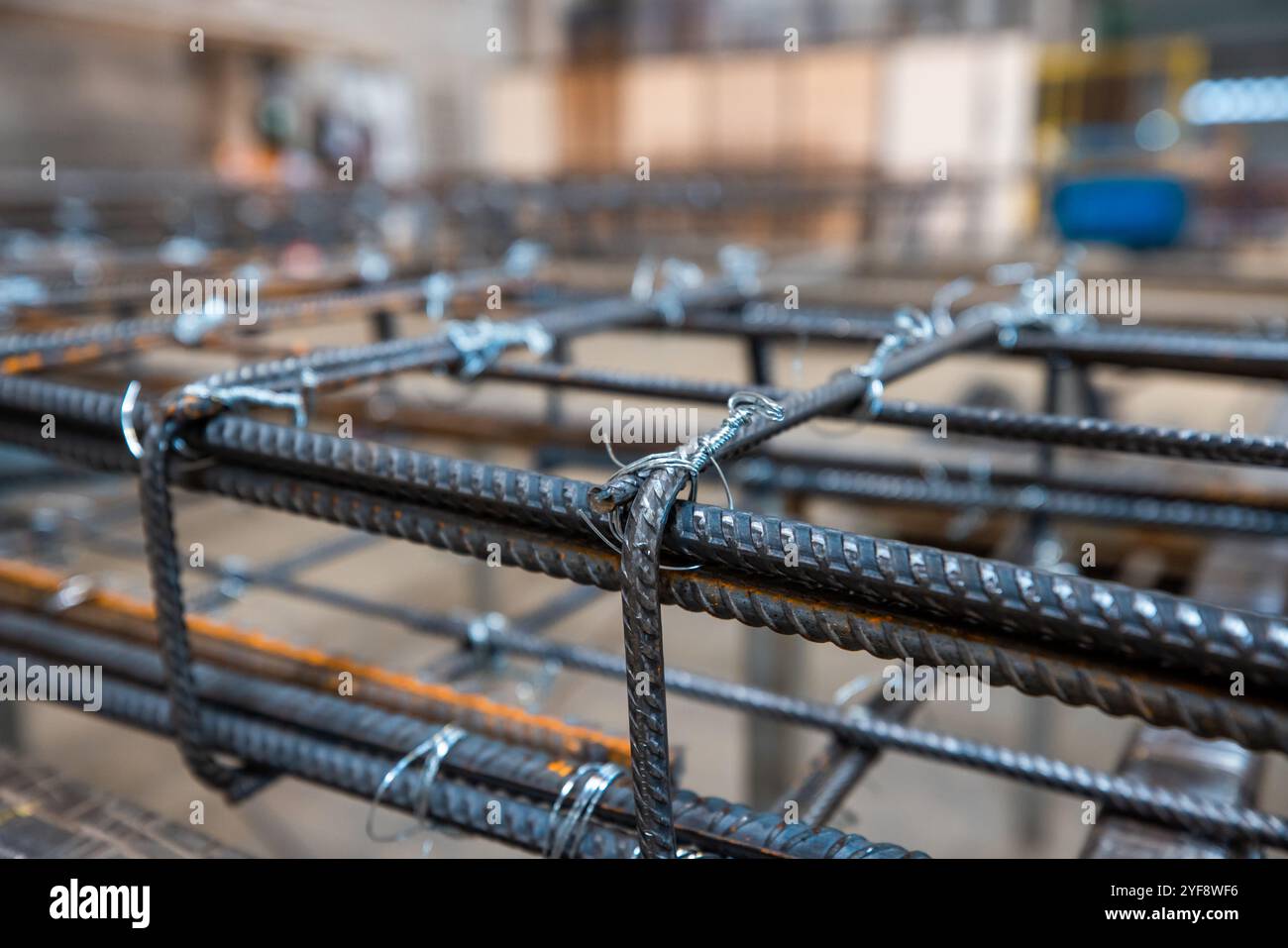 Steel rods or bars used to reinforce concrete, in warehouse at the ...