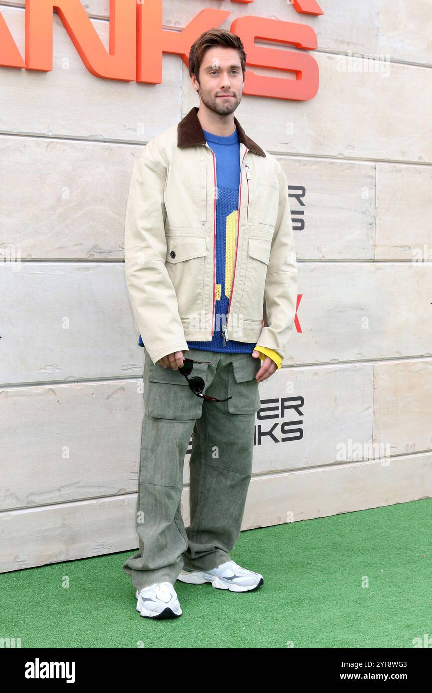 Austin North at arrivals for POGUELANDIA Netflix And Outer Banks Immersive Fan And Music ...