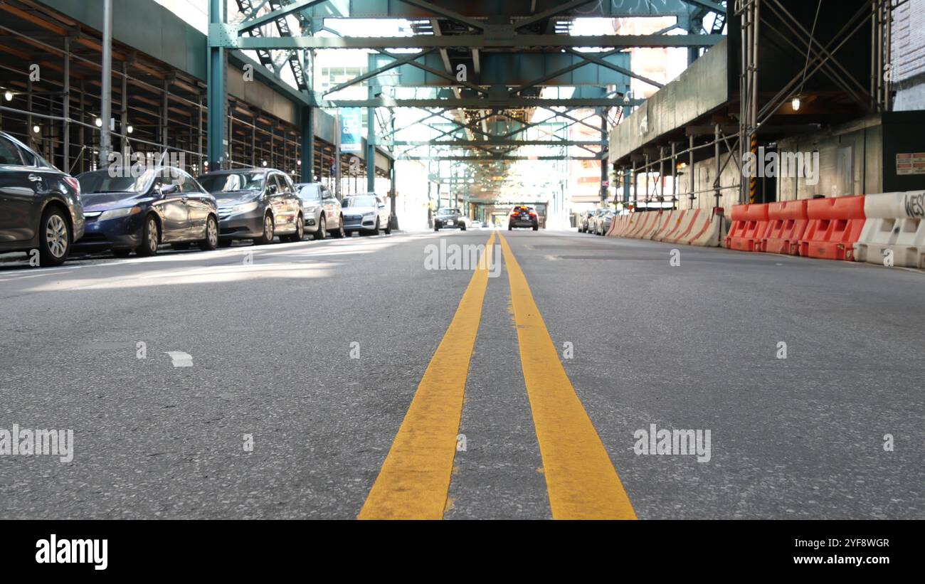 Elevated subway above New York city street. Metropolitan bridge over ...