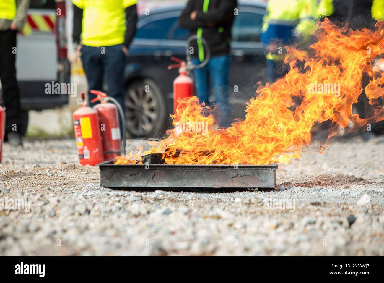 Fire flame in steel bucket for demonstrate to extinguish fire Stock ...