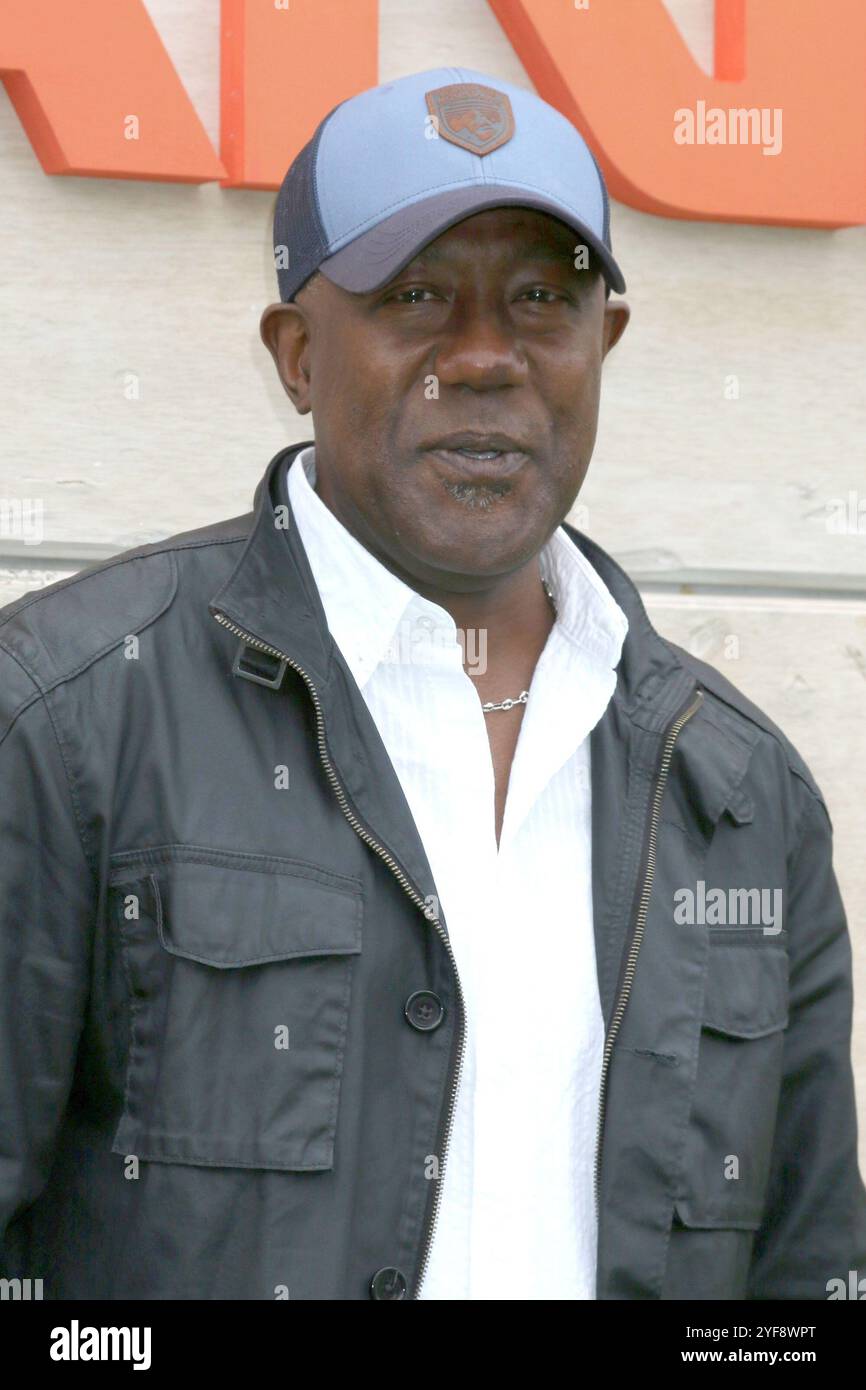 E. Roger Mitchell at arrivals for POGUELANDIA Netflix And Outer Banks ...