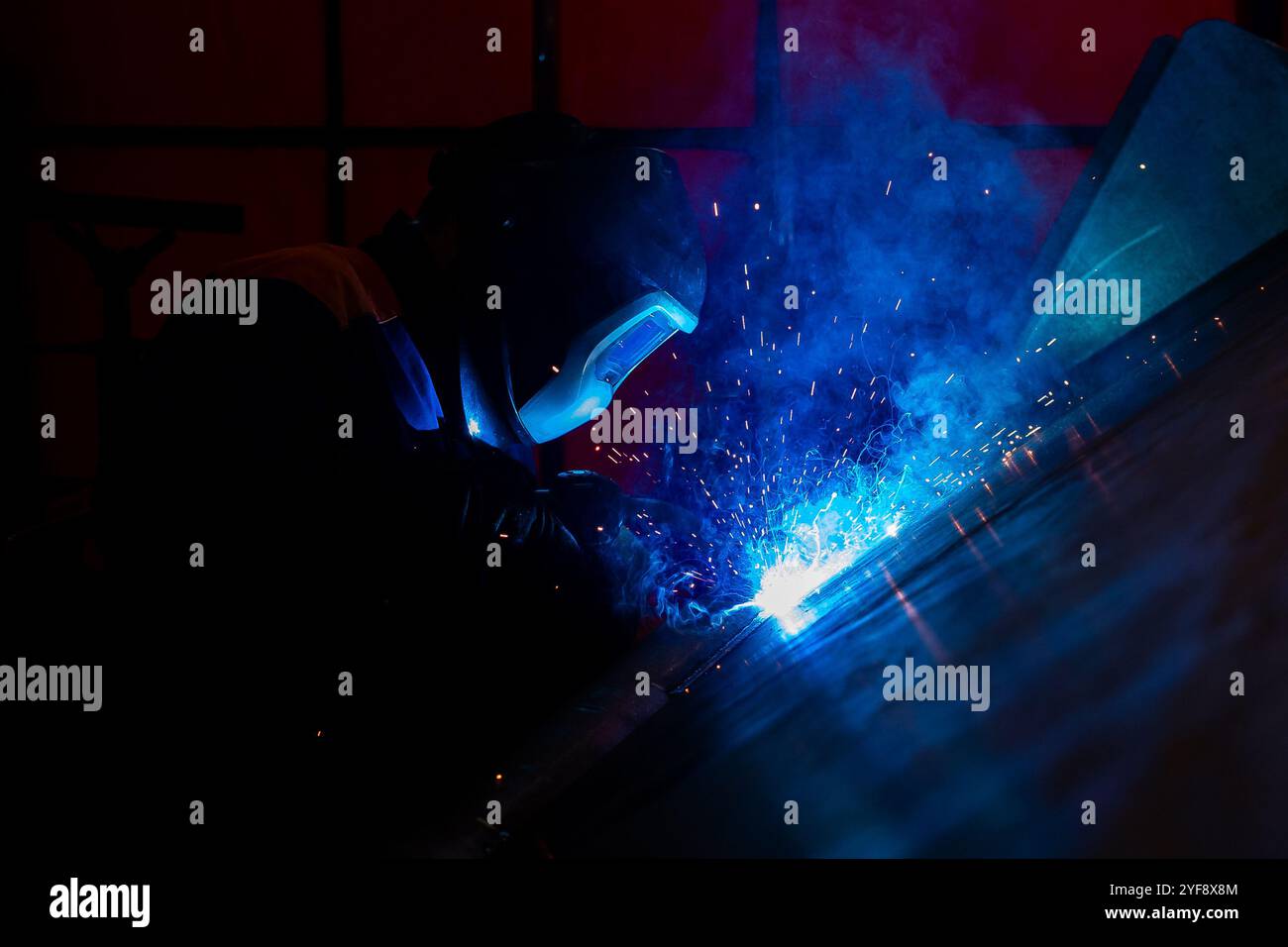 Closeup worker welding wearing hi-res stock photography and images - Alamy