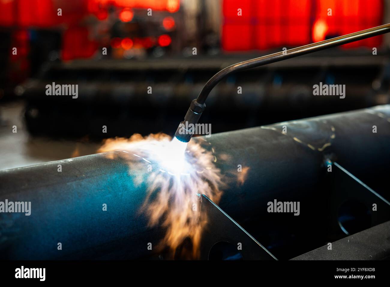 Heating up of metal construction with acetylene and oxygen burner in ...