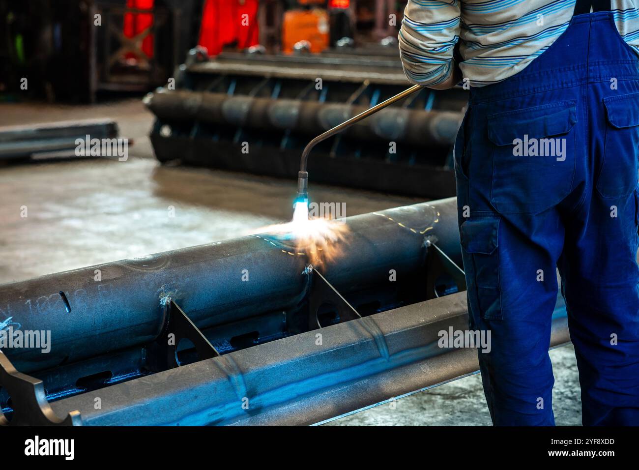 Heating up of metal construction with acetylene and oxygen burner in ...