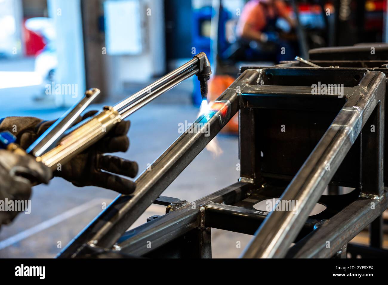 Heating up of metal construction with acetylene and oxygen burner in ...