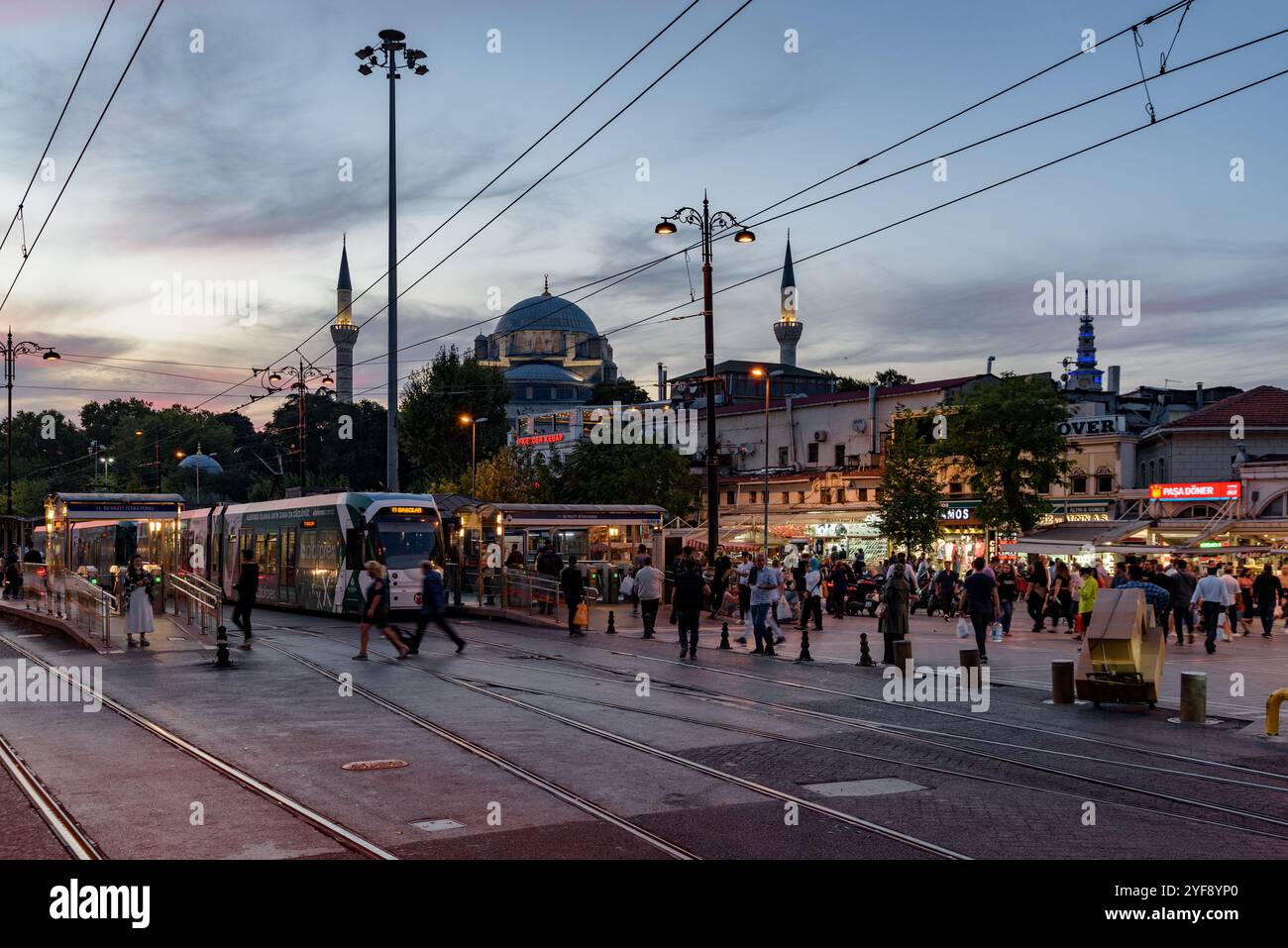 Dusk view of tramway in the Beyazit Square, Istanbul Stock Photo - Alamy
