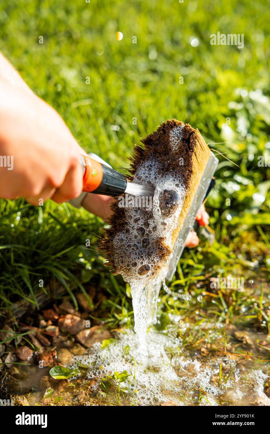Washing a brush cleaning after the painting work finished job Stock ...