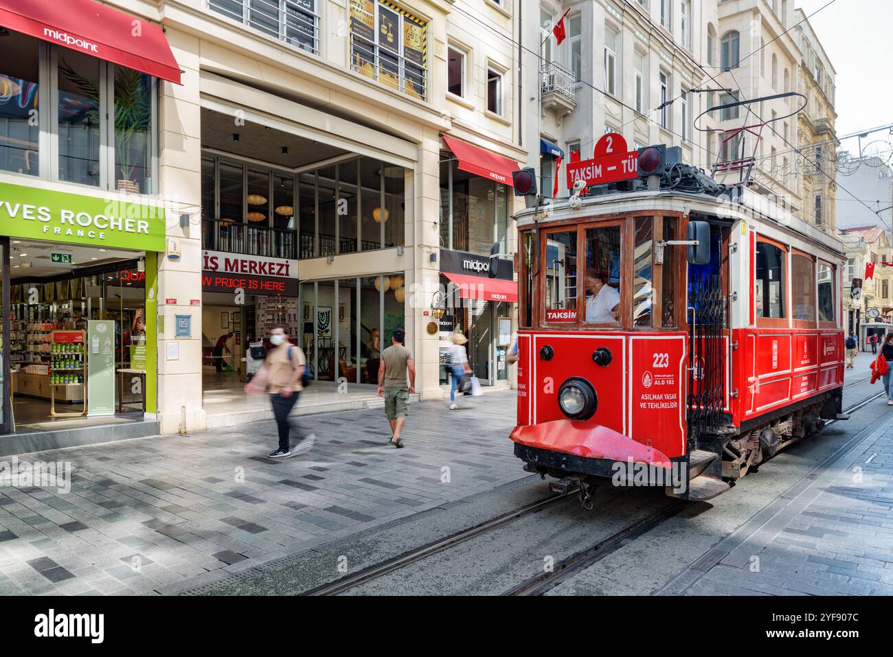 The Istanbul nostalgic tram on Istiklal Avenue, Turkey Stock Photo - Alamy