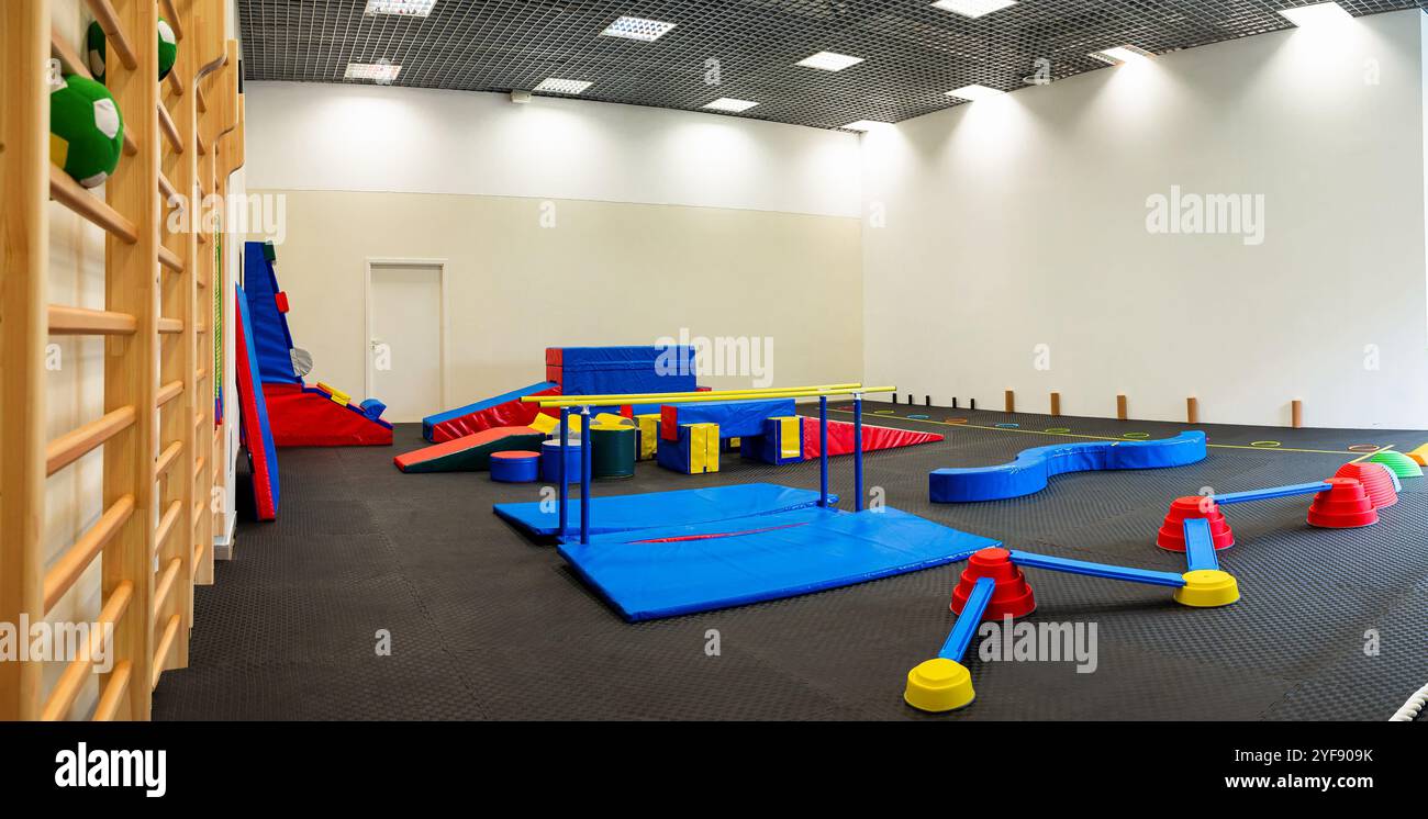 Colorful Gymnastic Equipment in Modern Training Room Kid's Physical ...