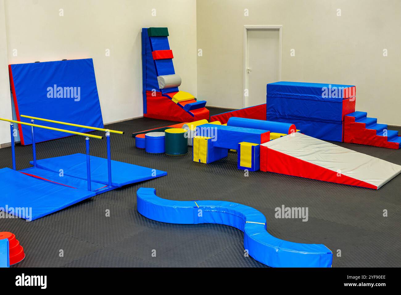 Colorful Gymnastic Equipment in Modern Training Room Kid's Physical ...