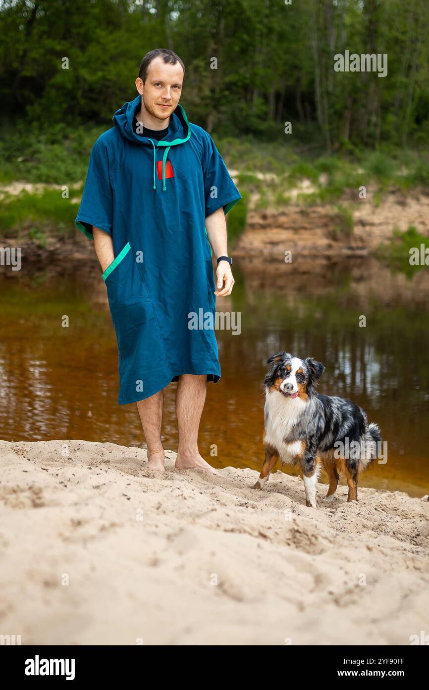 Teal poncho hi-res stock photography and images - Alamy