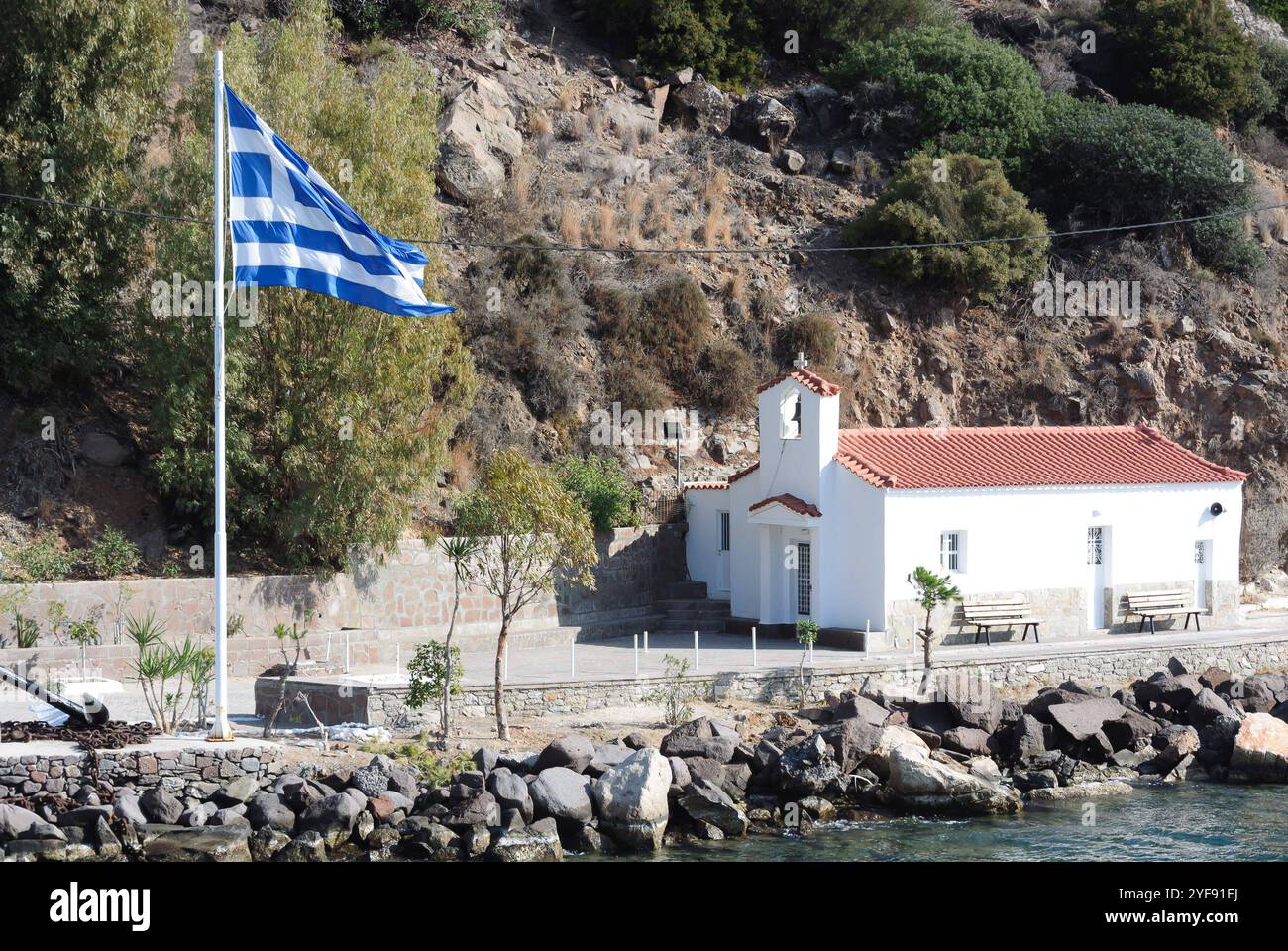 mall chapel with greek flag on the island of poros, greece *** mall ...