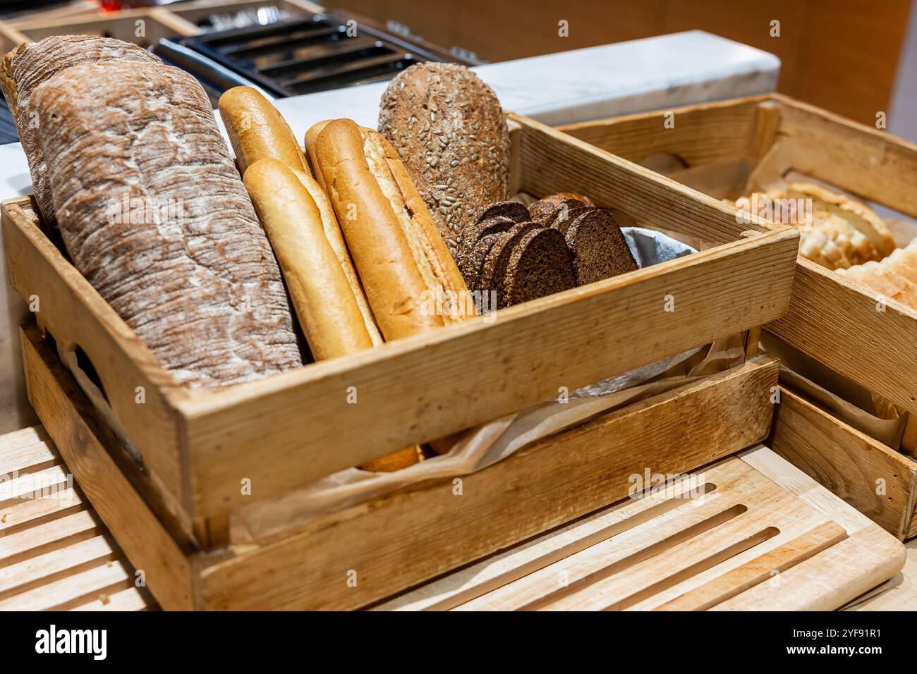 Assorted Fresh Bread Selection in Rustic Wooden Boxes at Buffet Stock ...