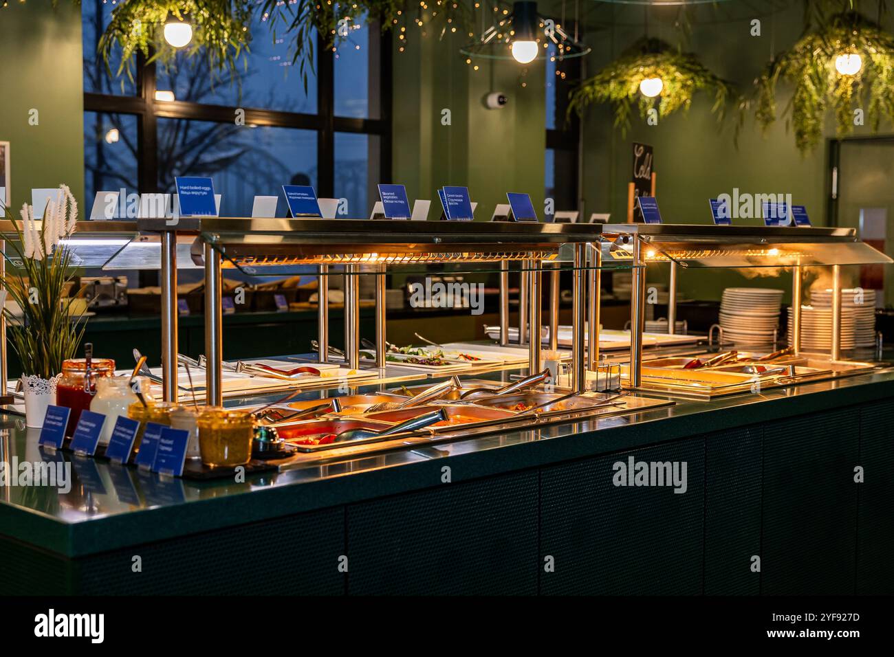 Elegant Buffet Spread with Various Dishes and Labels in hotel Stock ...