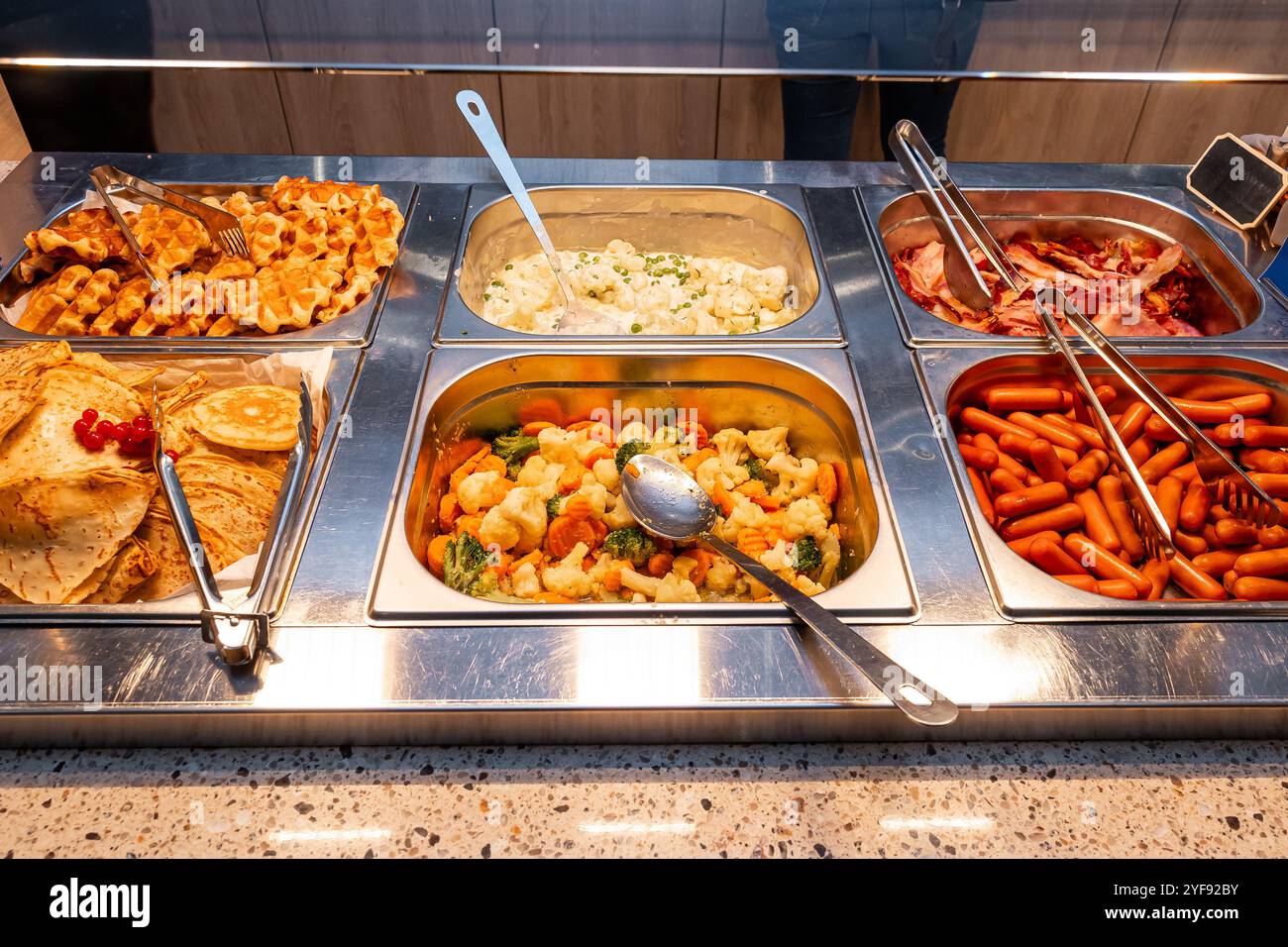 Hot Buffet Counter with Assorted Breakfast Foods and Sides in hotel ...