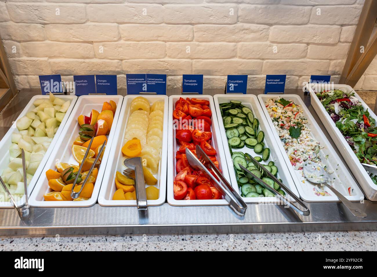 Elegant Buffet Spread with Fresh Cut Fruits and Vegetable Selection in ...